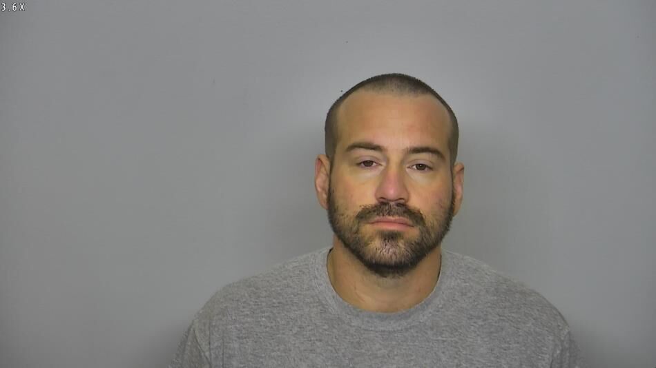 Bismarck man arrested in Mandan after stolen car pursuit-crash