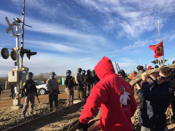 Protesters block railroad, stand up for missing women