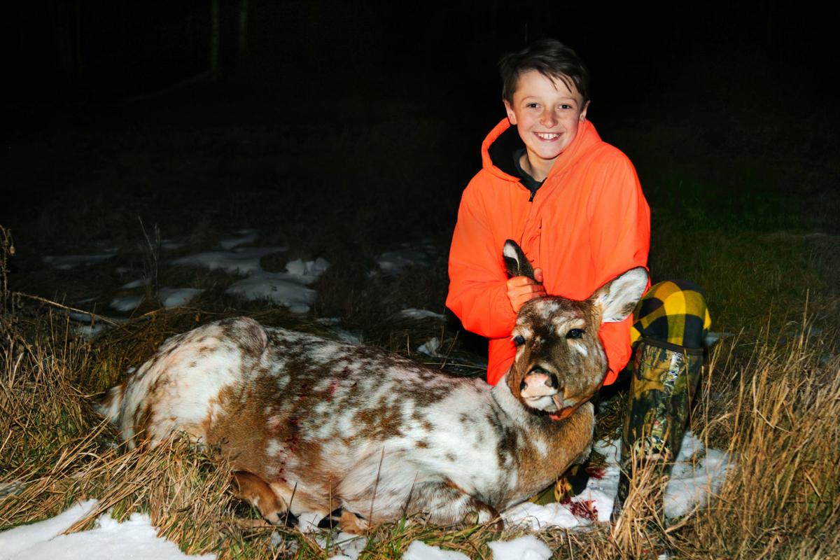 11-year-old boy bags deer of a different color — rare piebald doe