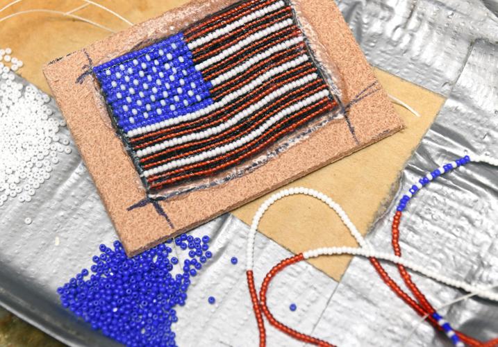 Local veteran spreads patriotism with beaded flags