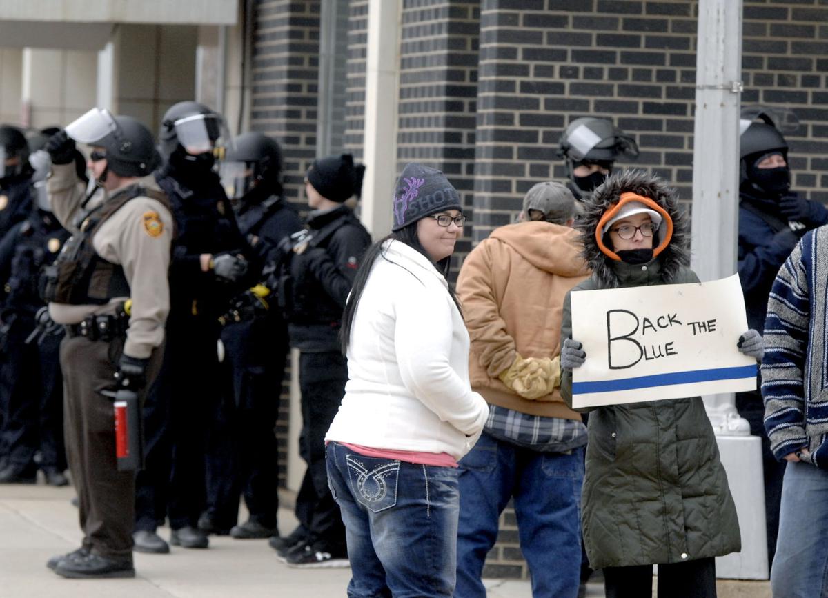 Photos: DAPL protesters march on Wells Fargo Bank