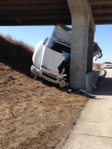 Semi Crashes Into Concrete Pillar