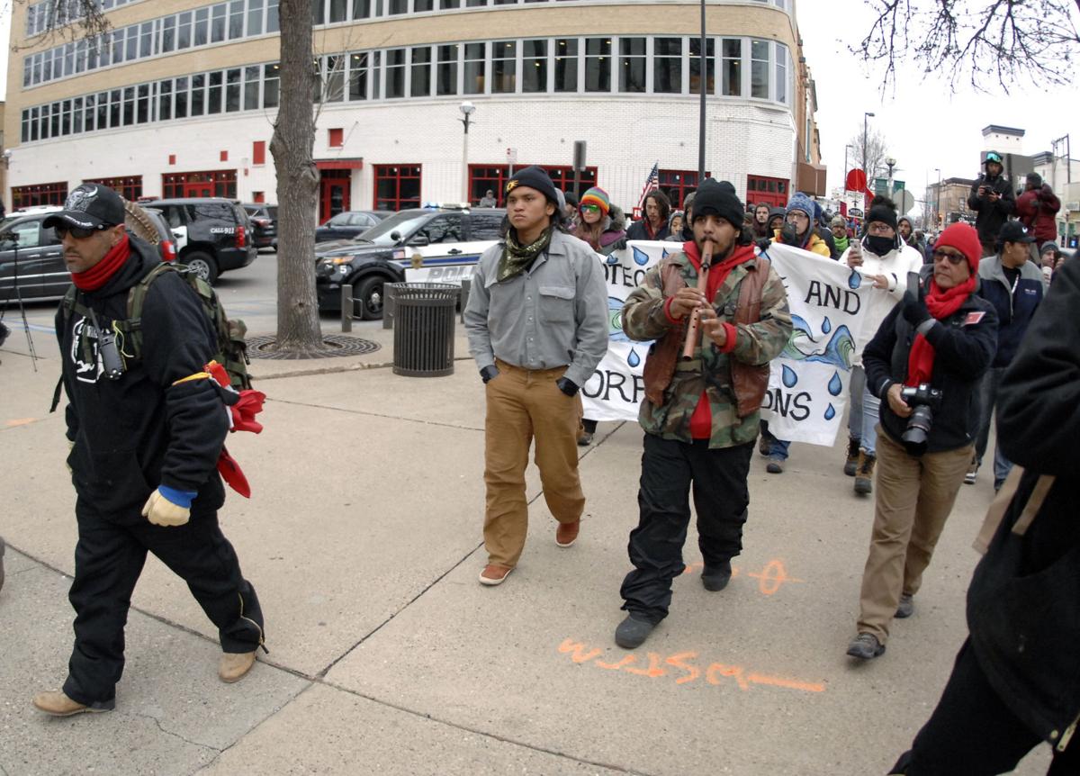 Photos: DAPL protesters march on Wells Fargo Bank | Tribune Photo ...