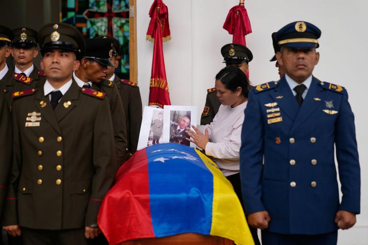 Photos show Venezuelans mourning loved ones killed during US operation ...