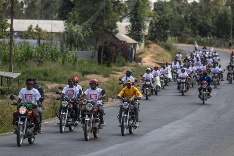 Motorcycle taxi drivers in Congo rally for Ebola awareness as attacks ...