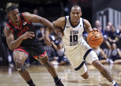San Diego State knocks off No. 18 Utah State 86-70 in MWC semifinals ...