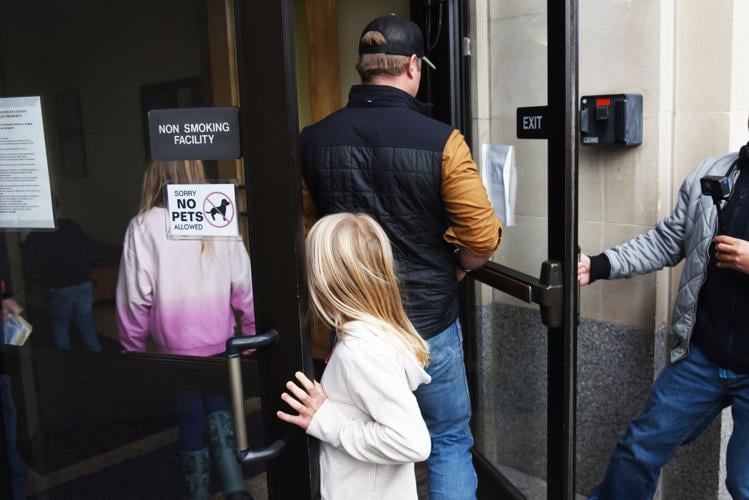Tim Sheehy casts his vote in Bozeman with wife and kids | News ...