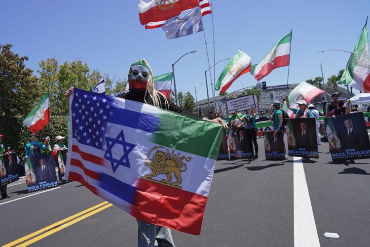 Iranian Americans protest for change outside Iran's World Cup match, in ...