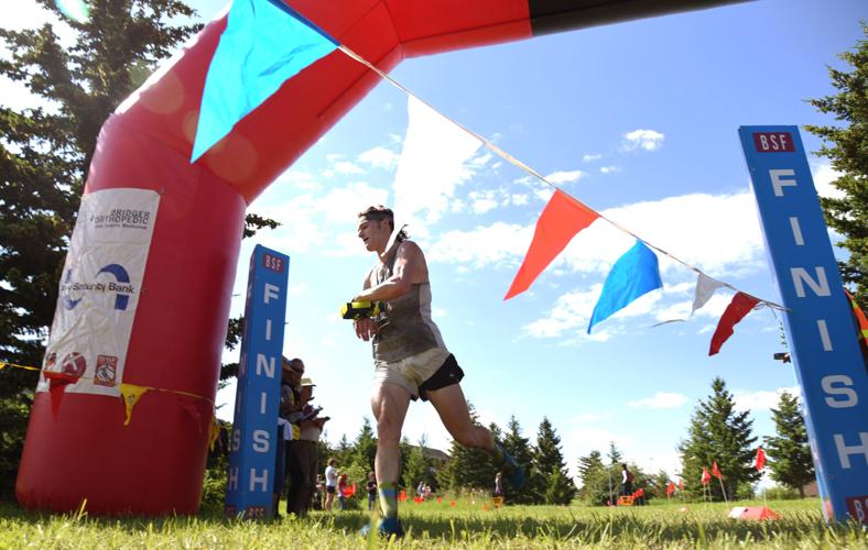 Runners battle mud in annual Jim Bridger race | News ...