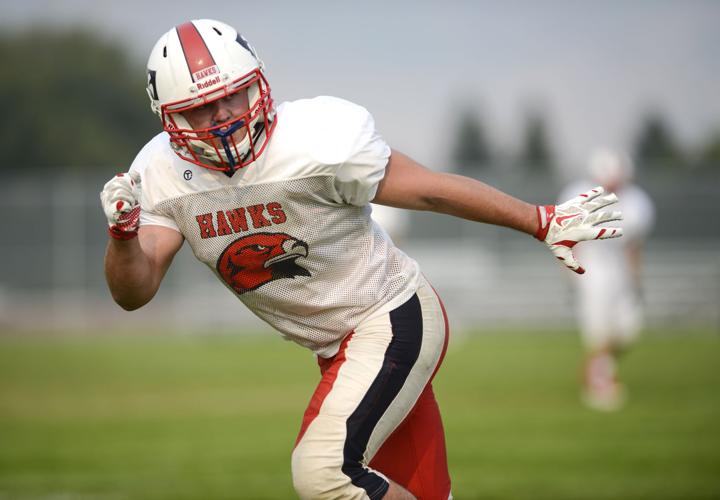 Fast defense leads Hawks into home opener | Prep Football ...