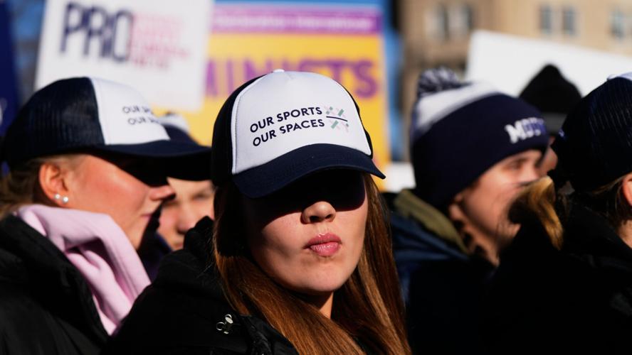 Photos of demonstrators outside the Supreme Court as it considers ...