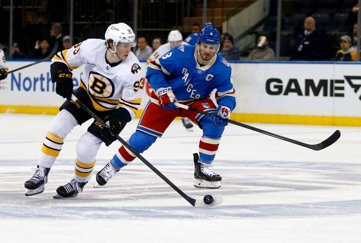 Matthew Robertson scores in OT to lift the Rangers over the Bruins 4-3 ...