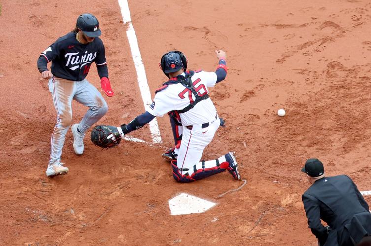 Twins complete three-game sweep over Red Sox with 6-5 win at soggy ...