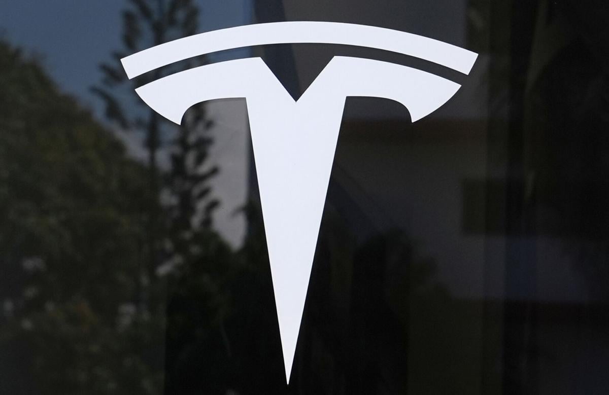 Tesla loses title as world's biggest electric vehicle maker as sales ...