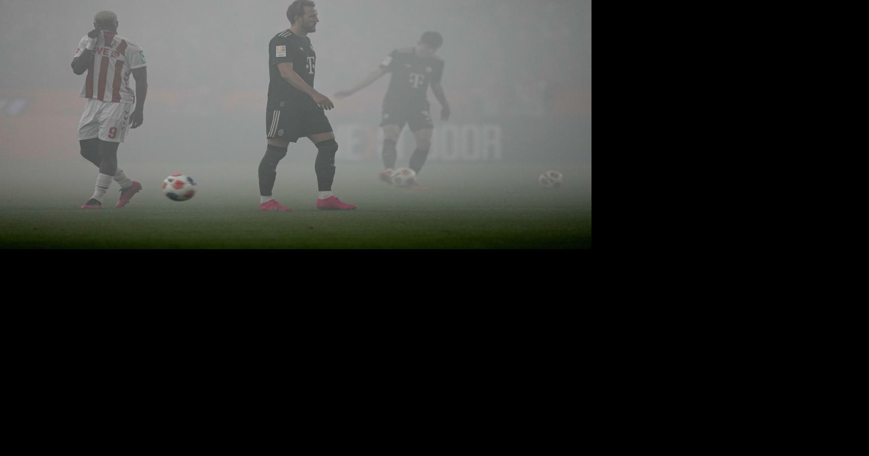 Bayern beats Cologne and sets a record after smoke stops play in ...