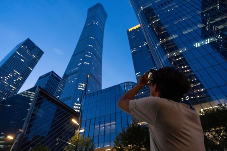 Small plane crash at Beijing high-rise kills the pilot and injures 13 ...