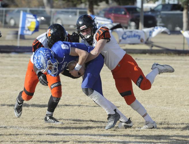 First class: Manhattan football caps undefeated season with landmark ...