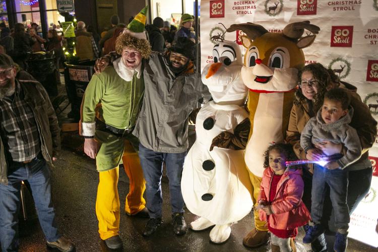 Santa goes strolling: Thousands gather downtown for annual Christmas ...