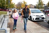 Tim Sheehy casts his vote in Bozeman with wife and kids | News ...
