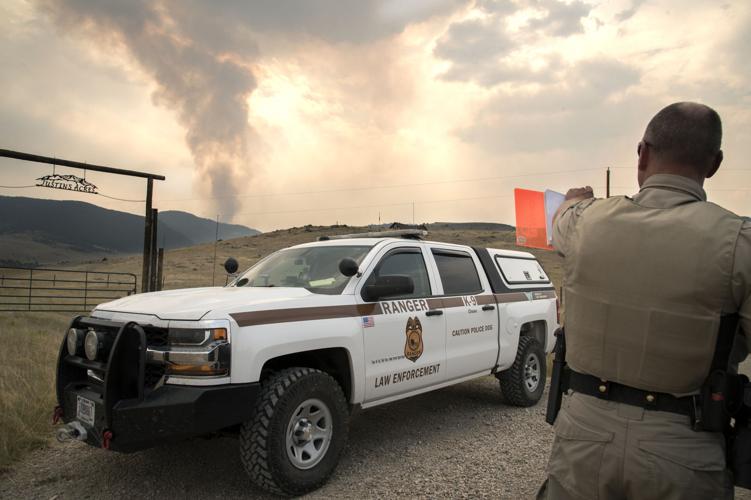 Fire crews set up camp while working blazes south of Ennis | Wildfires ...