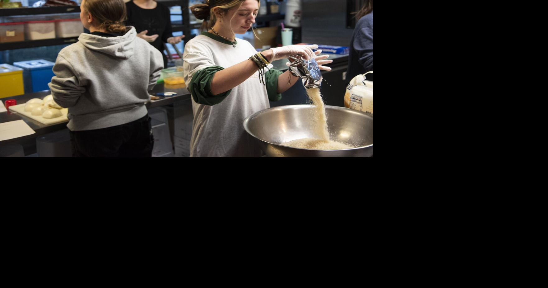 'Like caroling, but with food': MSU freshman continues delivering free ...