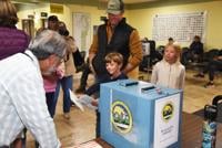 Tim Sheehy casts his vote in Bozeman with wife and kids | News ...