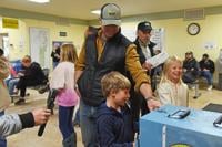 Tim Sheehy casts his vote in Bozeman with wife and kids | News ...