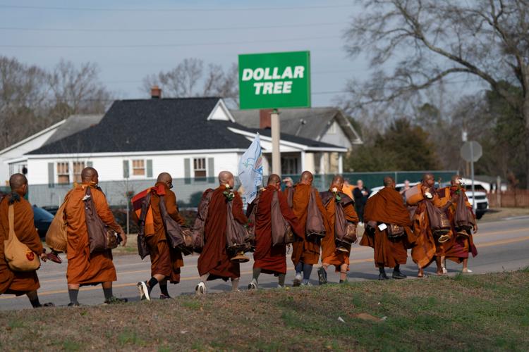 Buddhist monks and their dog captivate Americans while walking for ...
