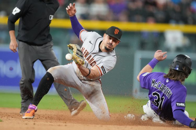 Jake McCarthy hits 2-run homer, drives in 4 runs in the Rockies' 8-3 ...