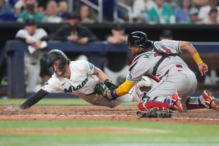 Marlins break game open with 4 runs in the 8th, beat Diamondbacks 10-6 ...
