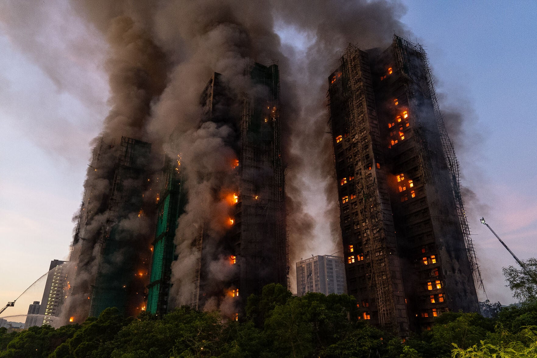 Hong Kong charges 7 people and 2 firms over deadly fire that killed 168 ...