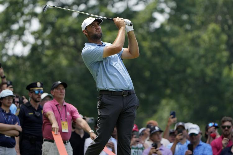 Scottie Scheffler outlasts protest on 18th green, Tom Kim to win ...