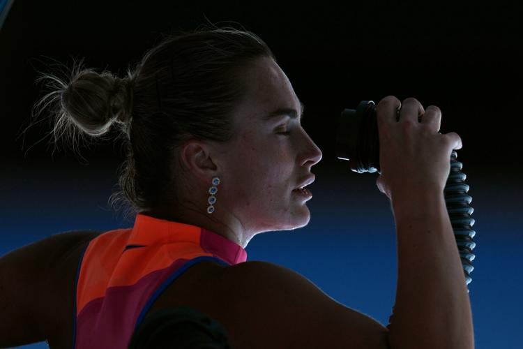 Spectators and players try to cool down during Australian Open heatwave ...