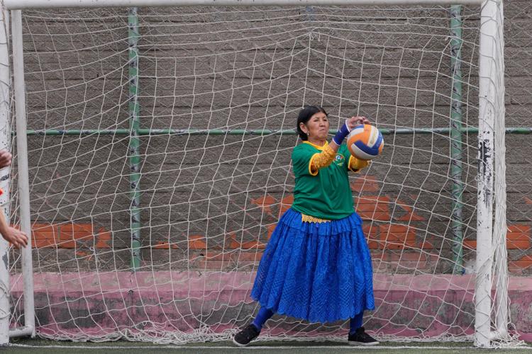 Photos of Bolivian cholitas embracing the bell skirt as a symbol of ...