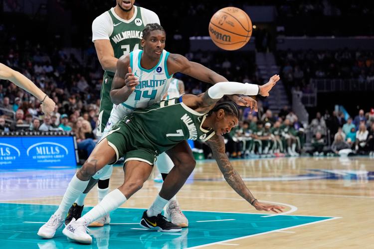 Portis, Antetokounmpo lead Bucks past Hornets 123-113 for first back-to ...