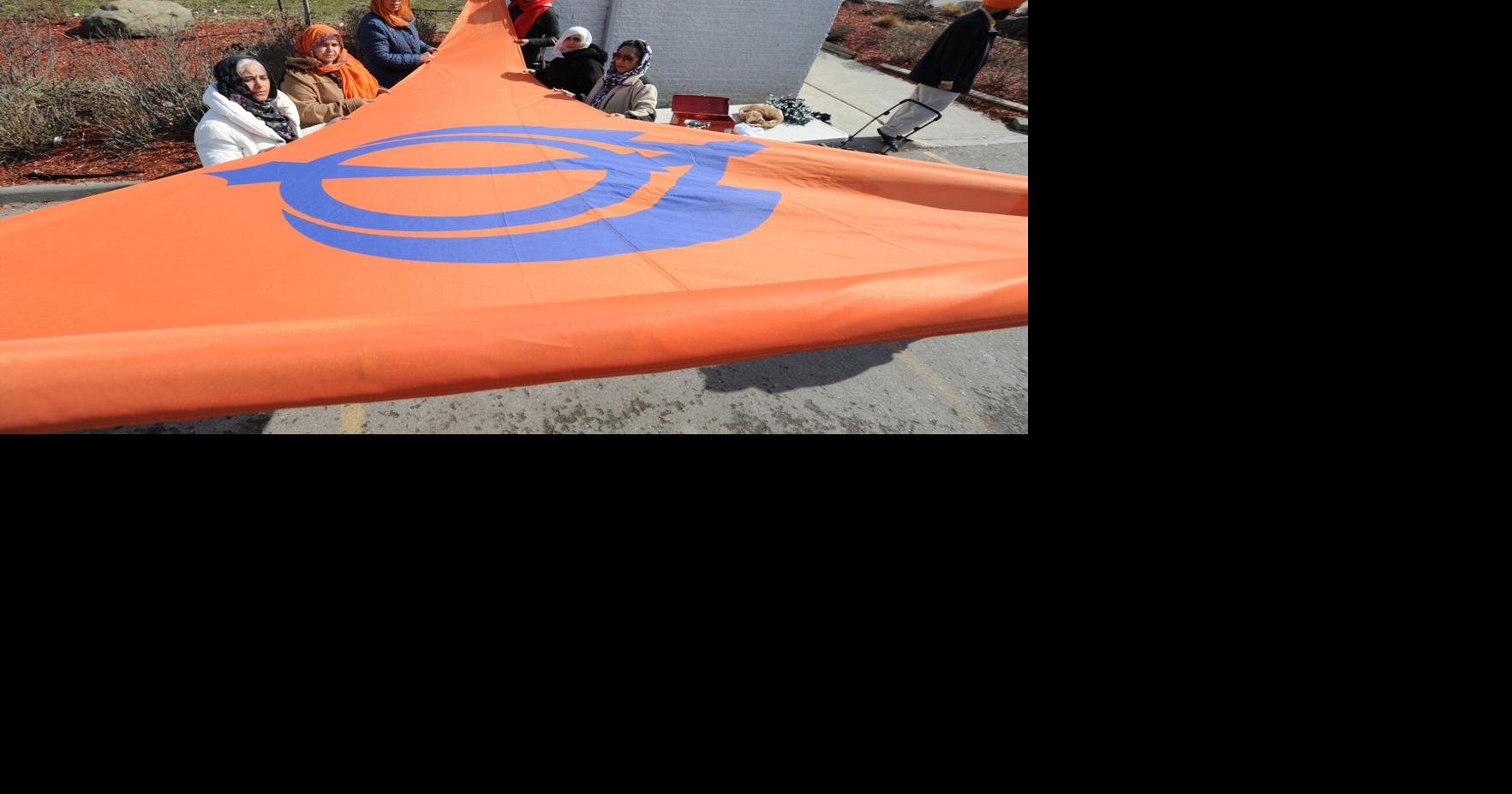 Colourful flag-raising helps celebrate Vaisakhi festival