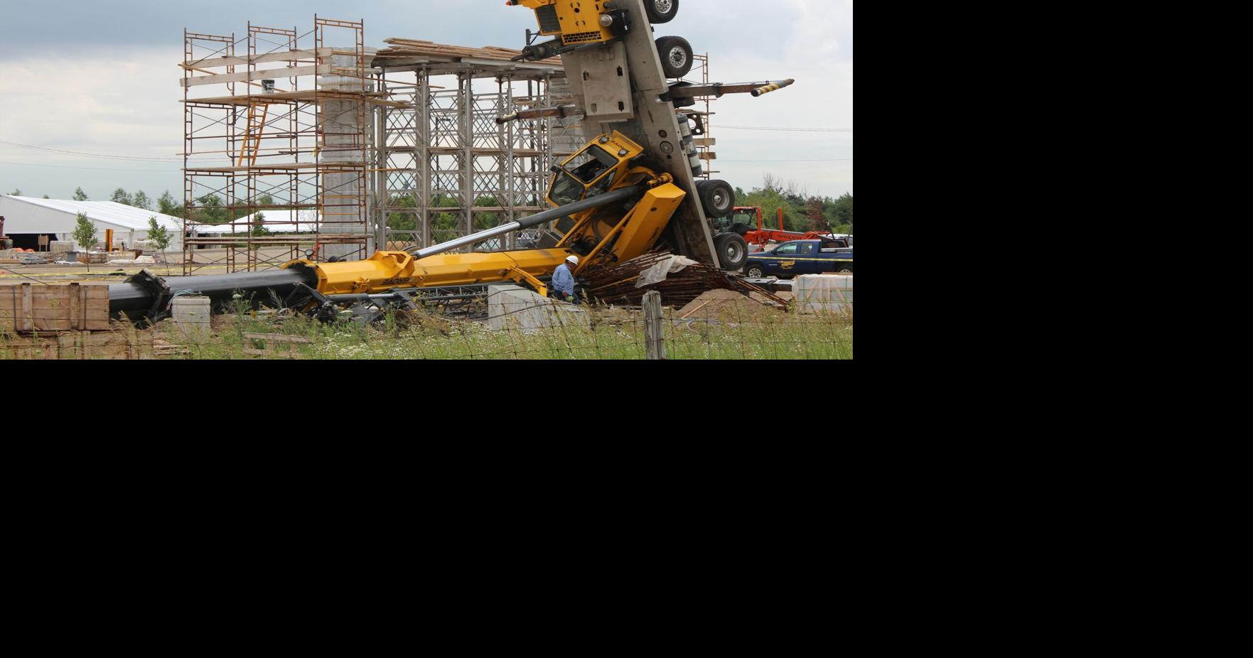 Minor injury at building site after crane topples
