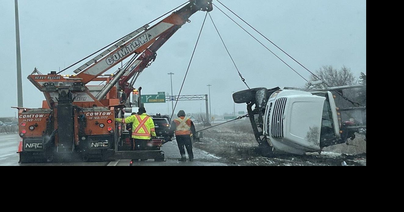 Crane truck rolls into ditch along Highway 410 in Brampton