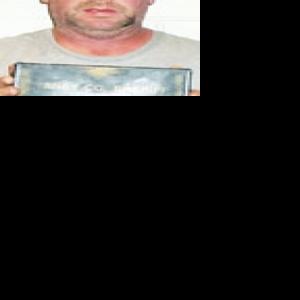 Singleton arrested for bank robbery | News Free | bransontrilakesnews.com