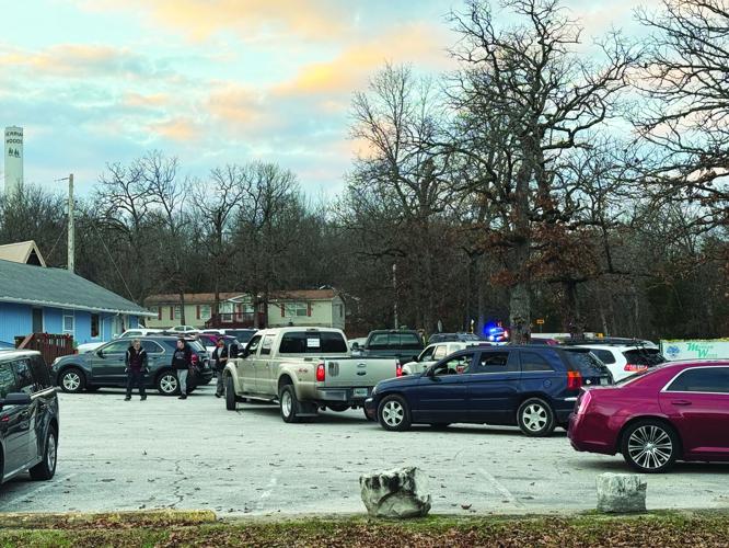 Hundreds receive items from Merriam Woods food distribution | Local ...
