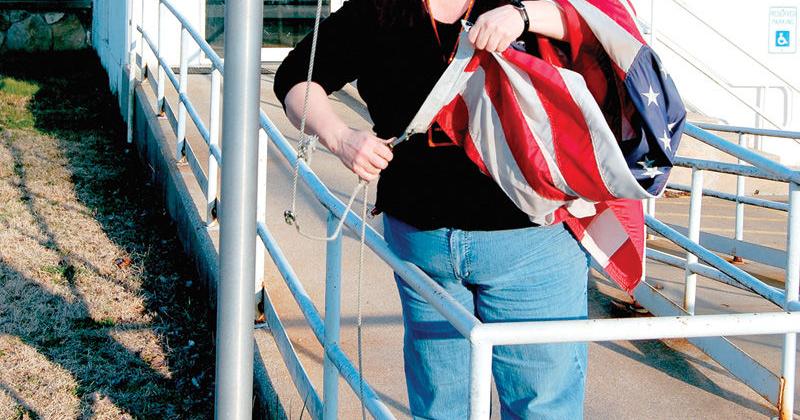 Postal worker begins work day with flag salute, Pledge of Allegiance ...