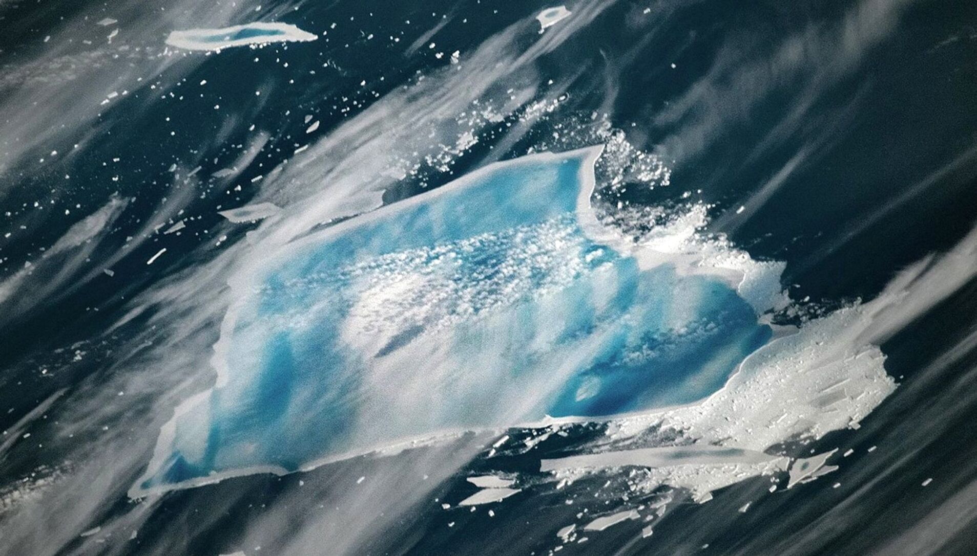 Iceberg that once world’s largest turning blue as it melts and dies ...