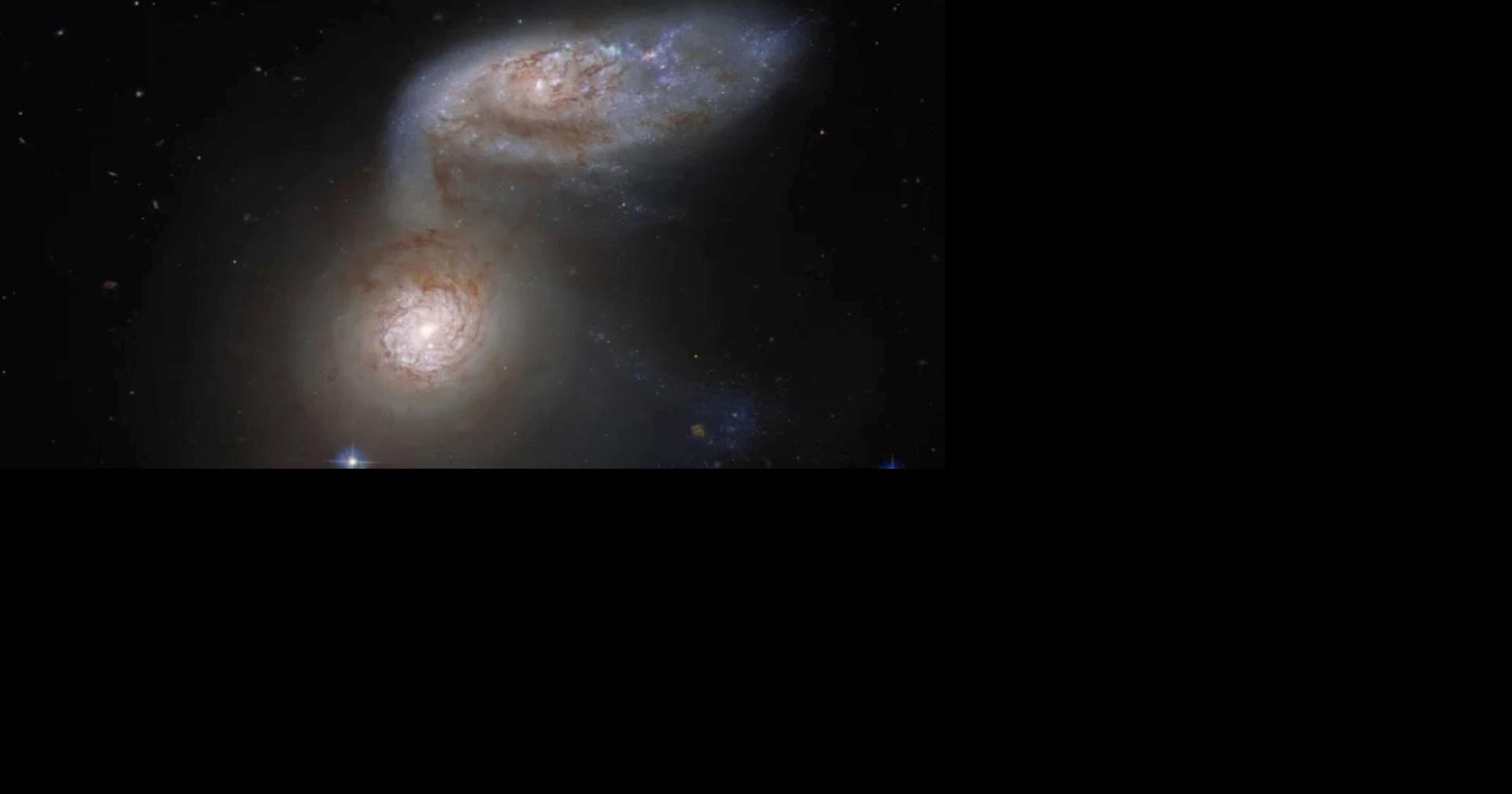 Astronomers capture two galaxies colliding, and more of today's top videos