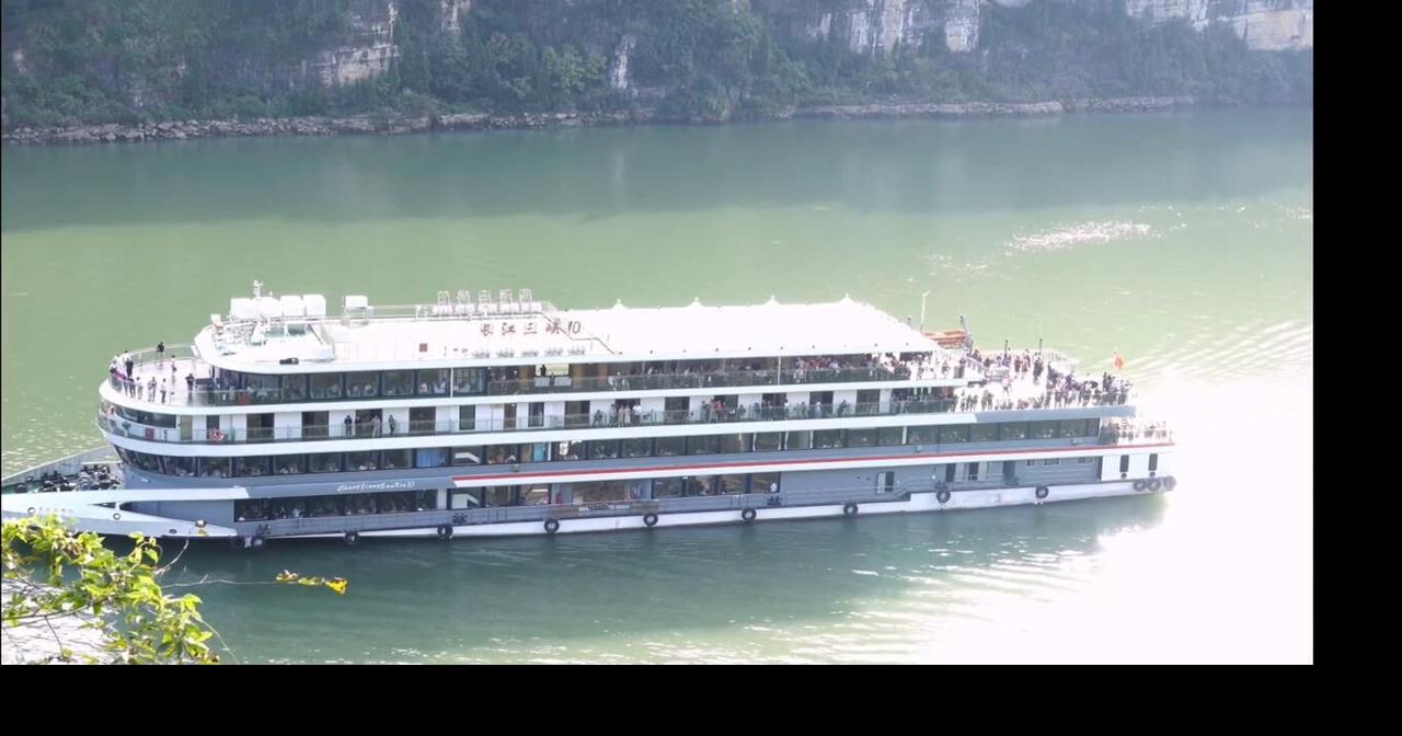 Three Gorges cruise ship carries tourists on a tour in Yichang, China