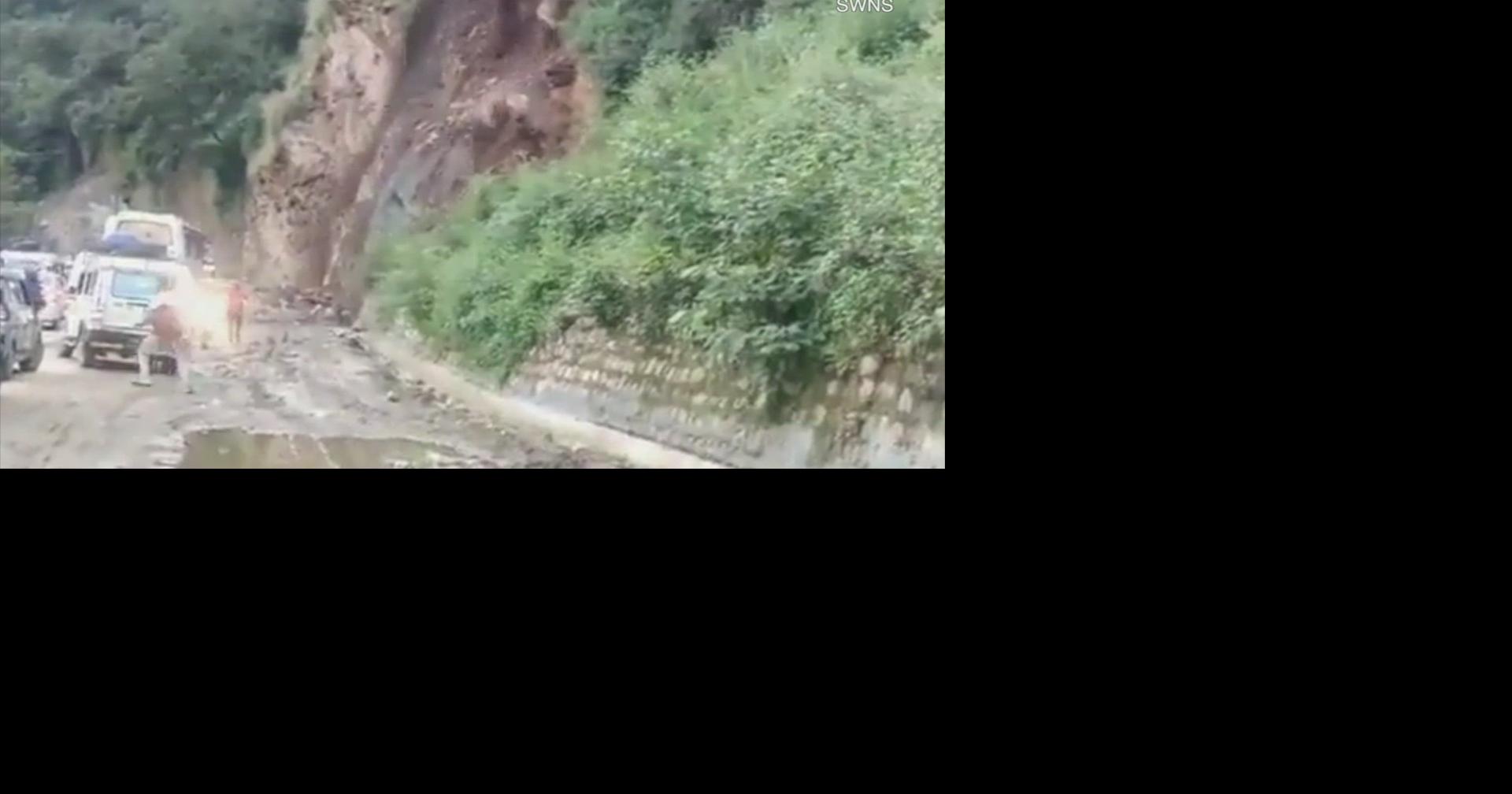 Drivers rush to escape landslide in India, and more of today's top videos