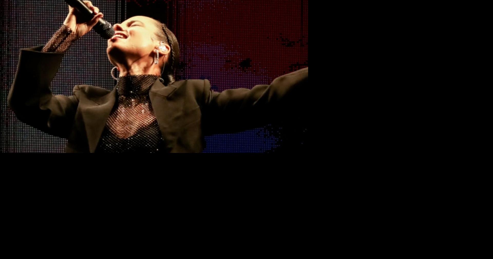 Alicia Keys blasts fan for attempting to kiss her during concert