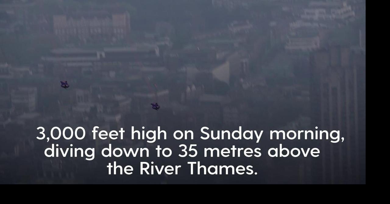 Skydivers complete wingsuit flight through Tower Bridge