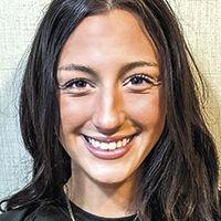 New Burton track and assistant volleyball coach Jayla Morris settling ...