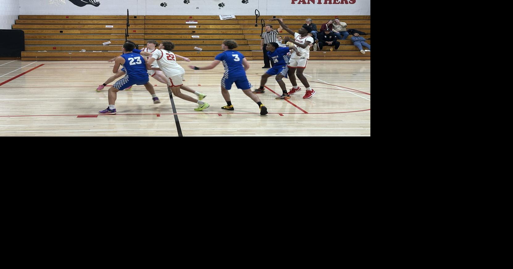 E.O. Smith Panthers boys basketball defeats Plainville in a nail-biter ...