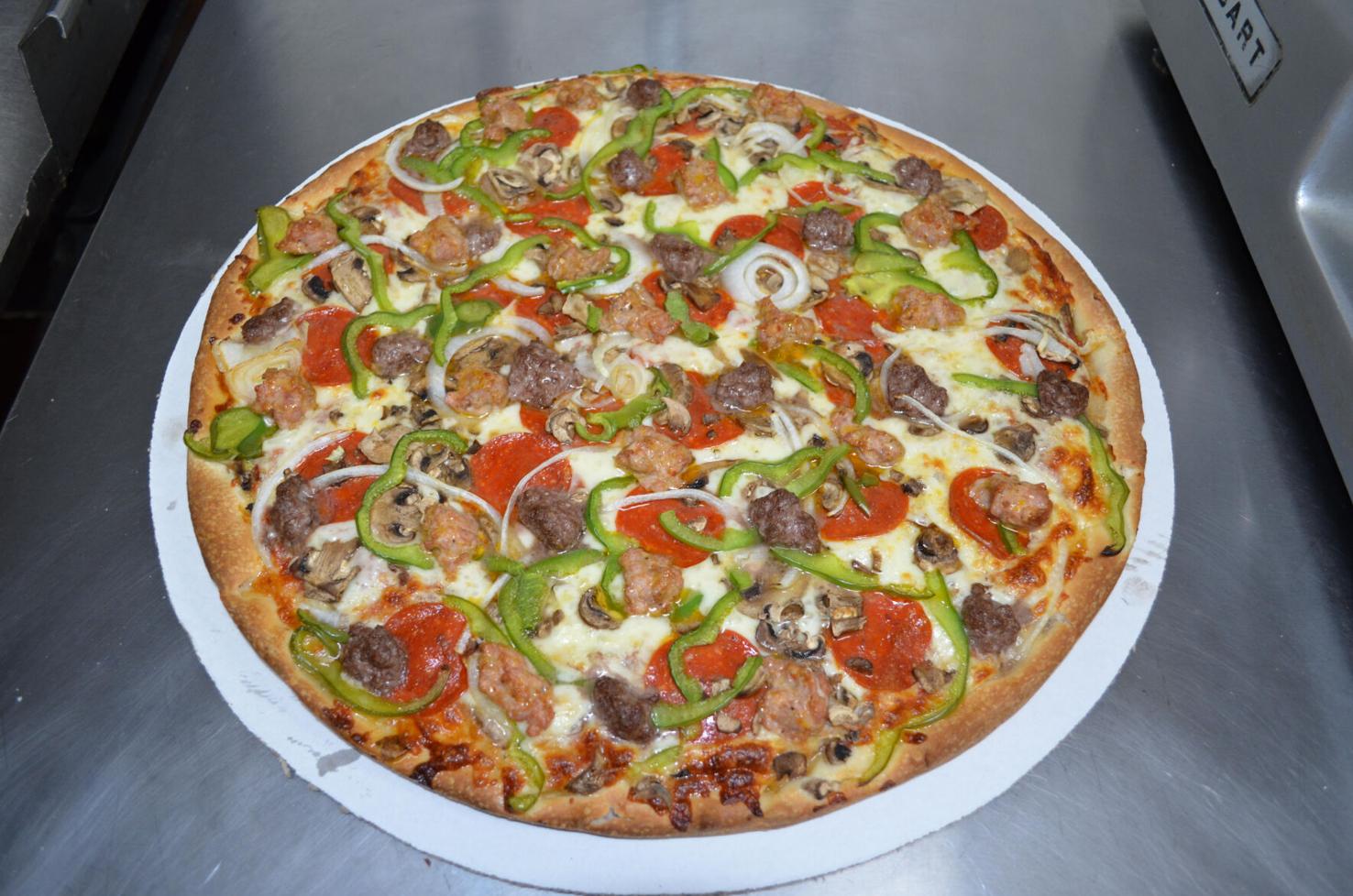 New Delta Pizza near town line is a homecoming for owner | News ...